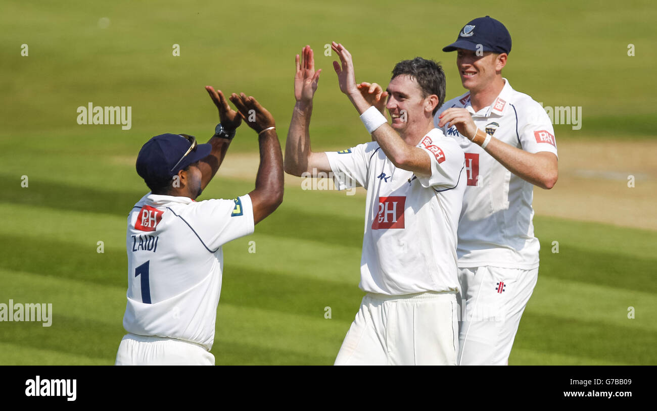 Sussex's Ashar Zaidi (left) and Steve Magoffin (middle) celebrate ...