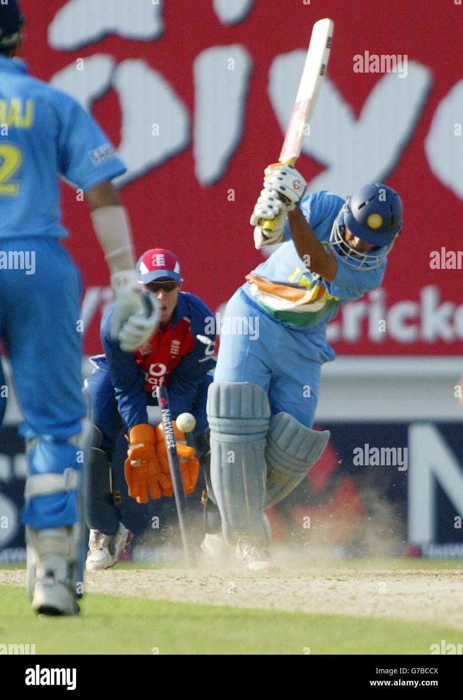 England's Ashley Giles clean bowls India's Rohan Gavaskar (right ...