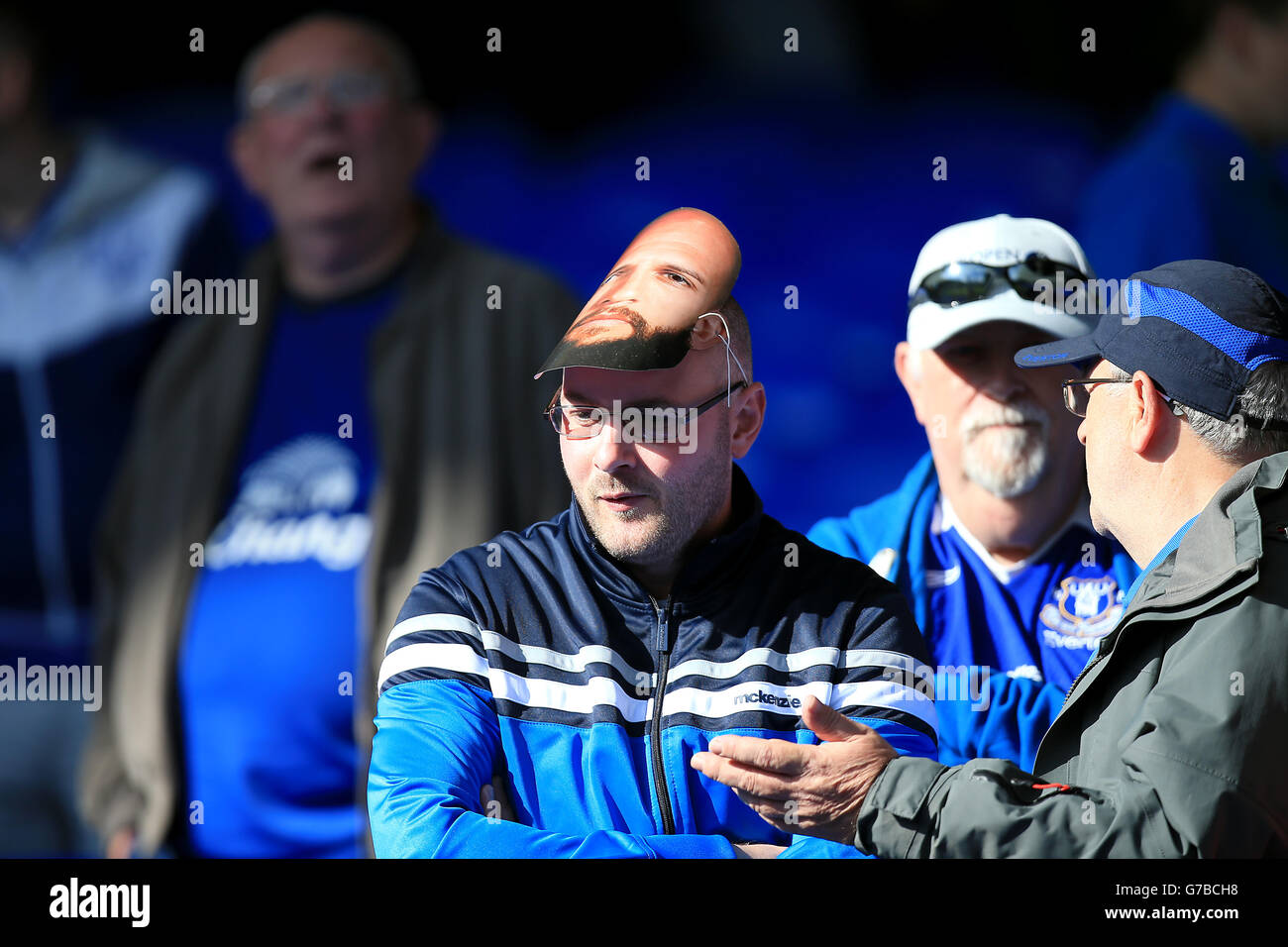 Everton fans wearing tim masks in the gwladys street end hi-res stock ...