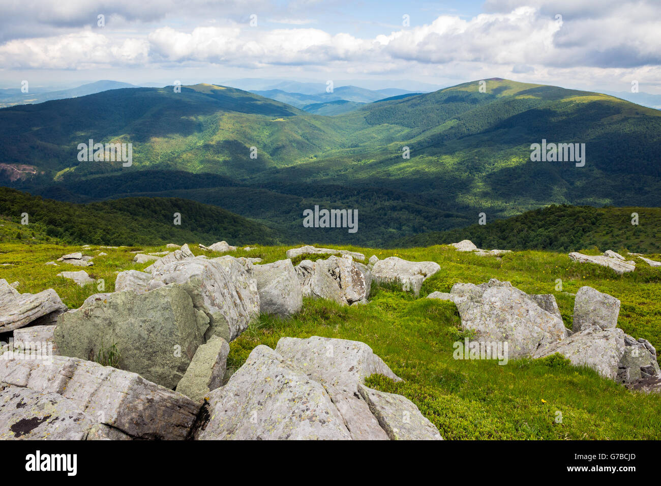 white sharp boulders on the hillside Stock Photo - Alamy