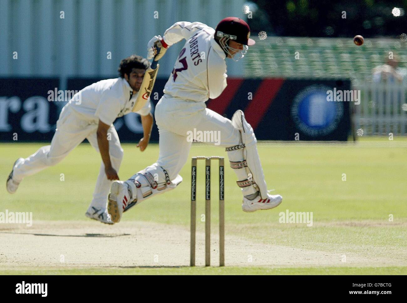 Northampton batsman Tim Roberts takes evasive action off the bowling of ...