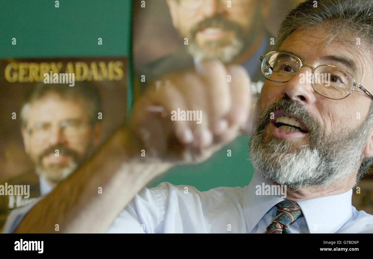Gerry Adams signs copies of his book Stock Photo - Alamy