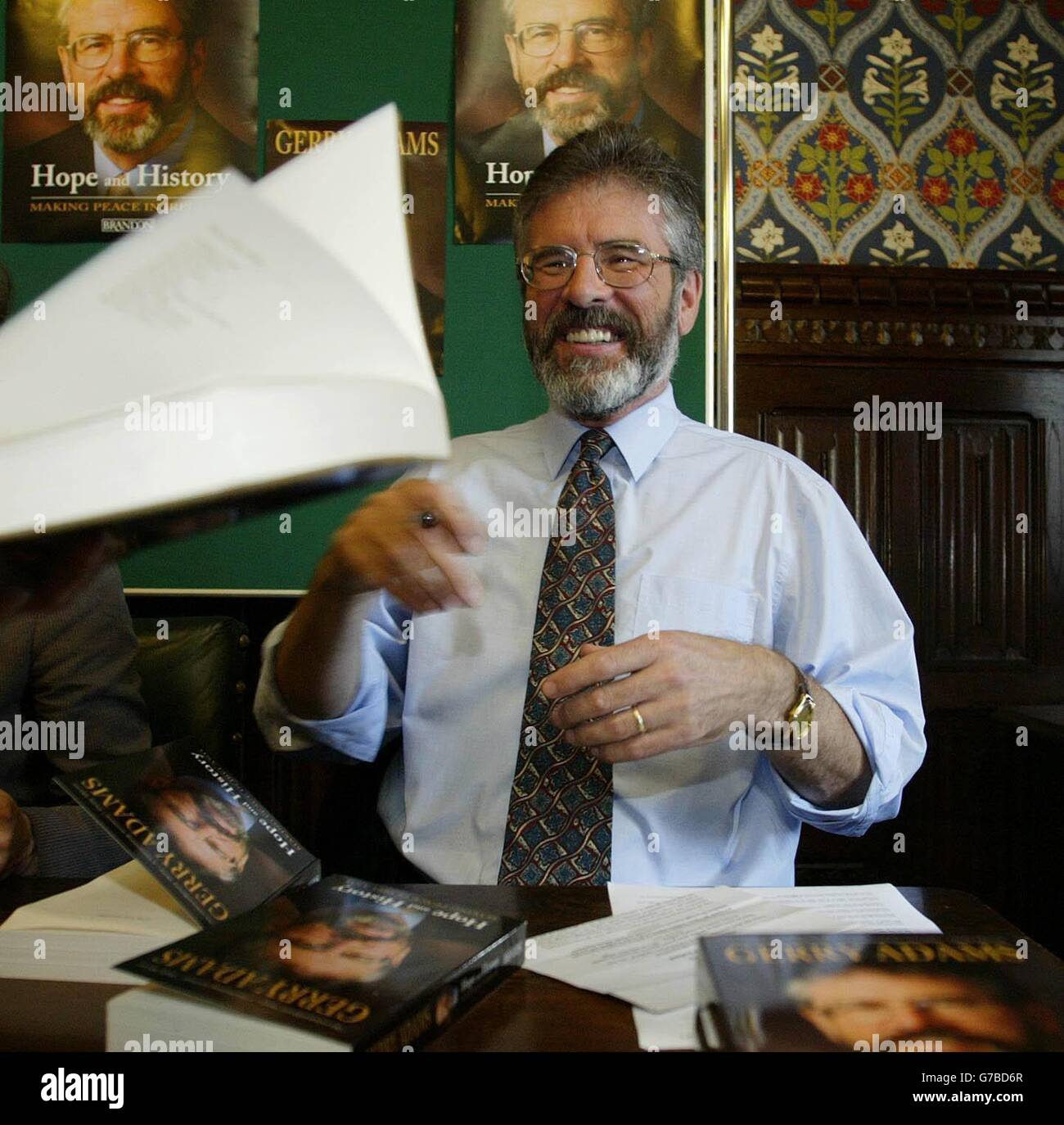 Gerry Adams signs copies of his book Stock Photo - Alamy