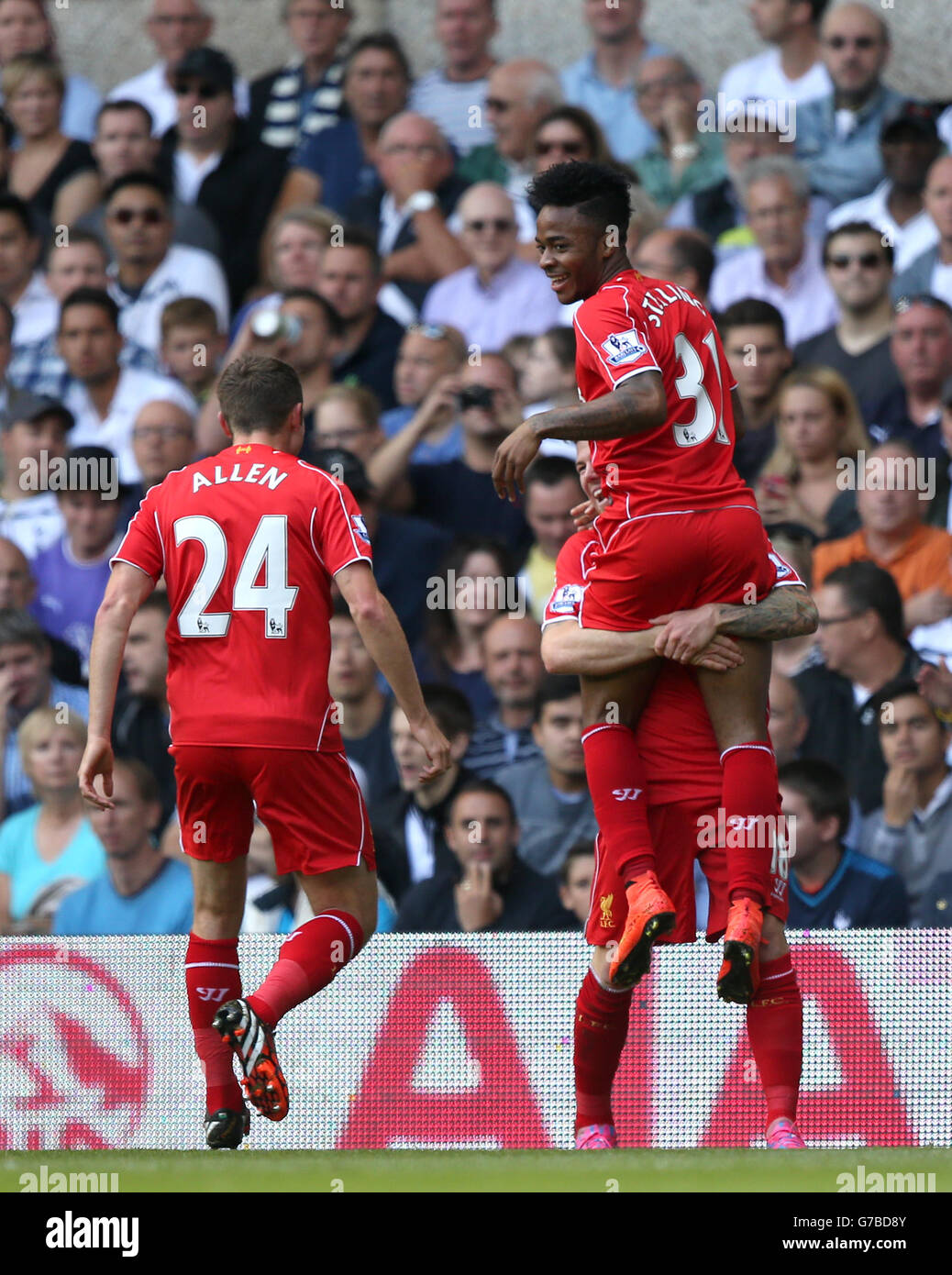 Liverpool's Raheem Sterling celebrates scoring his side's first goal of ...
