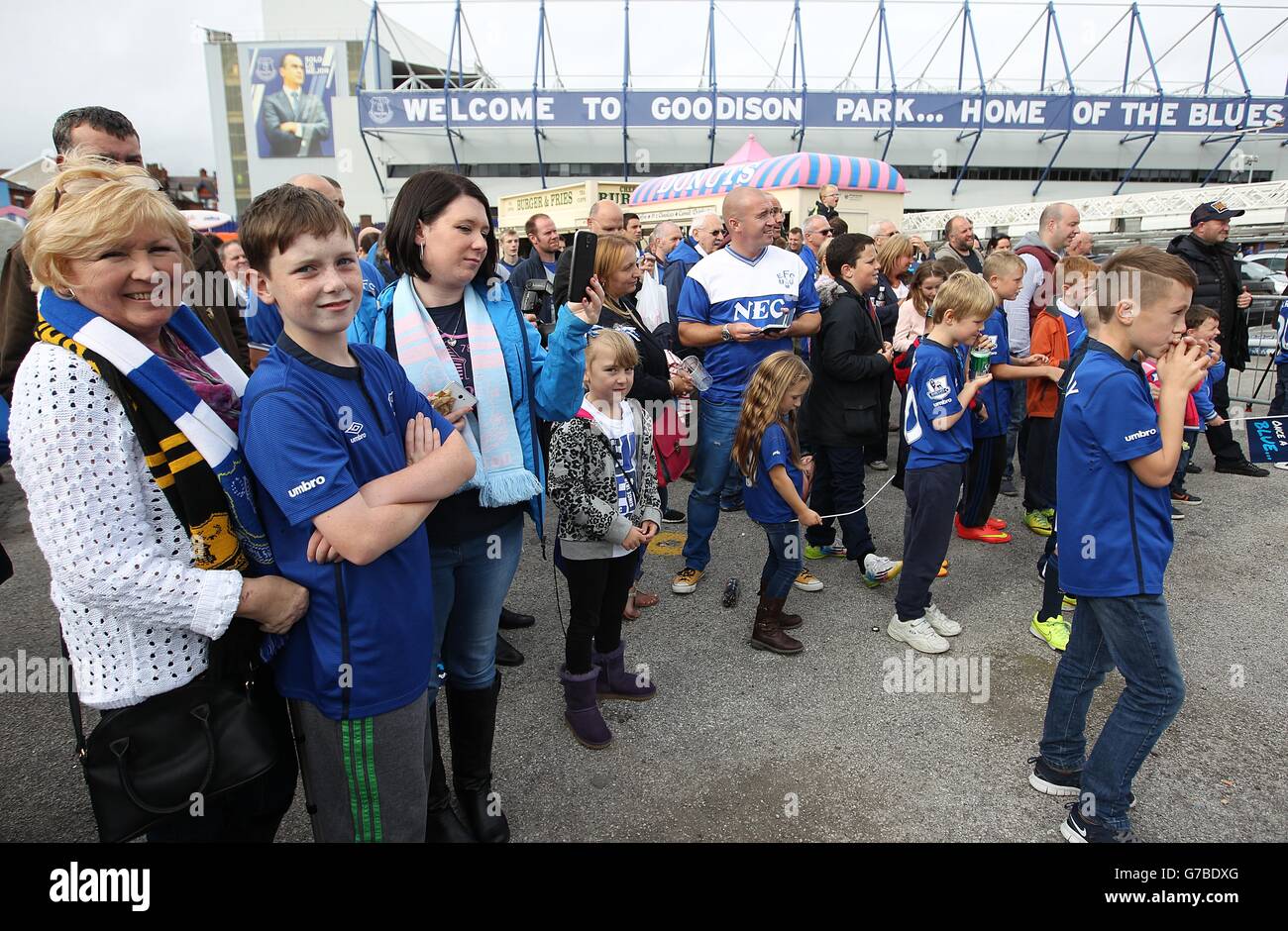 Fan watch the entertainment in the Everton fan zone before the match ...
