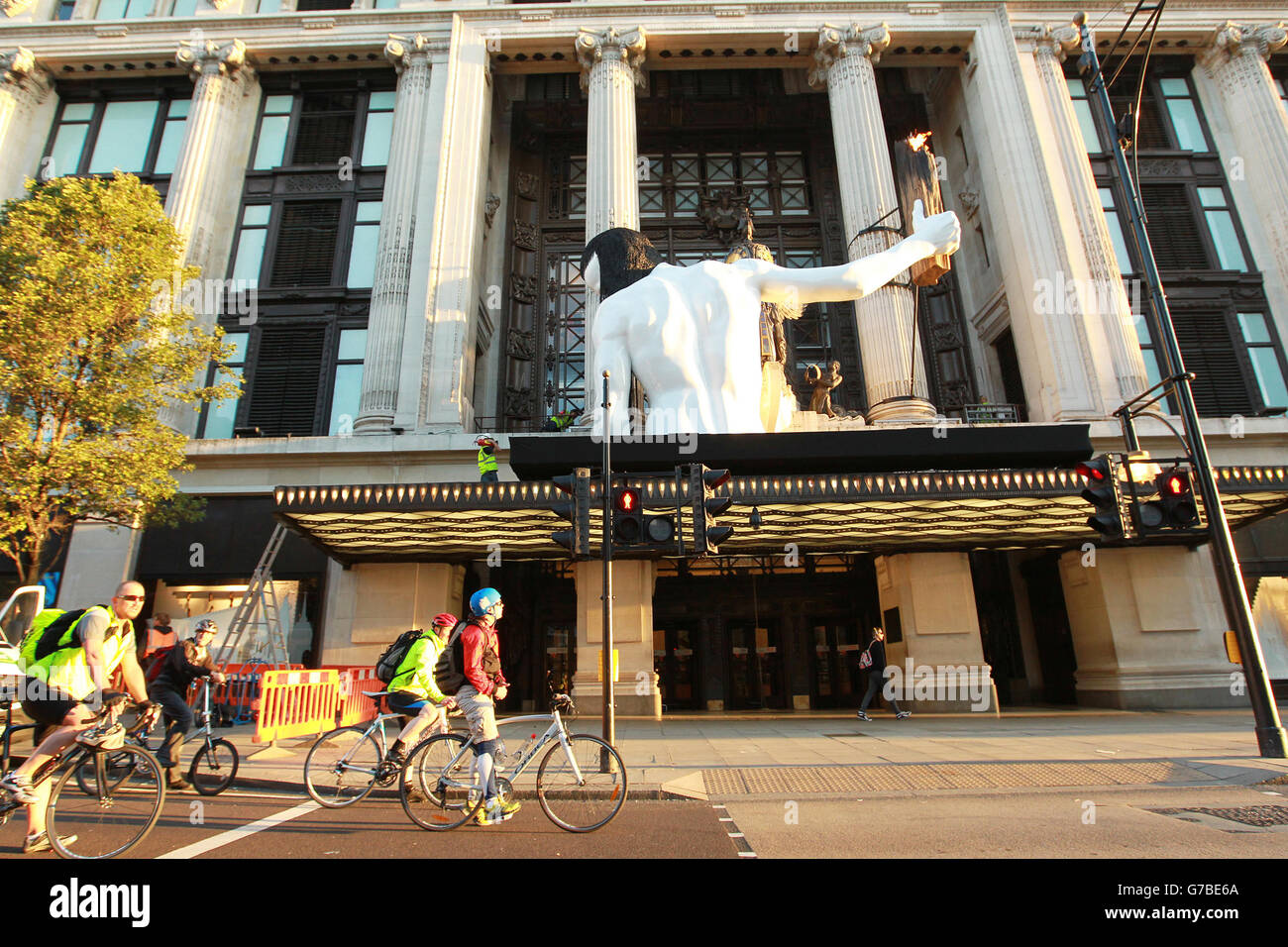 A 25-foot tall statue of American fashion designer Rick Owens is placed ...