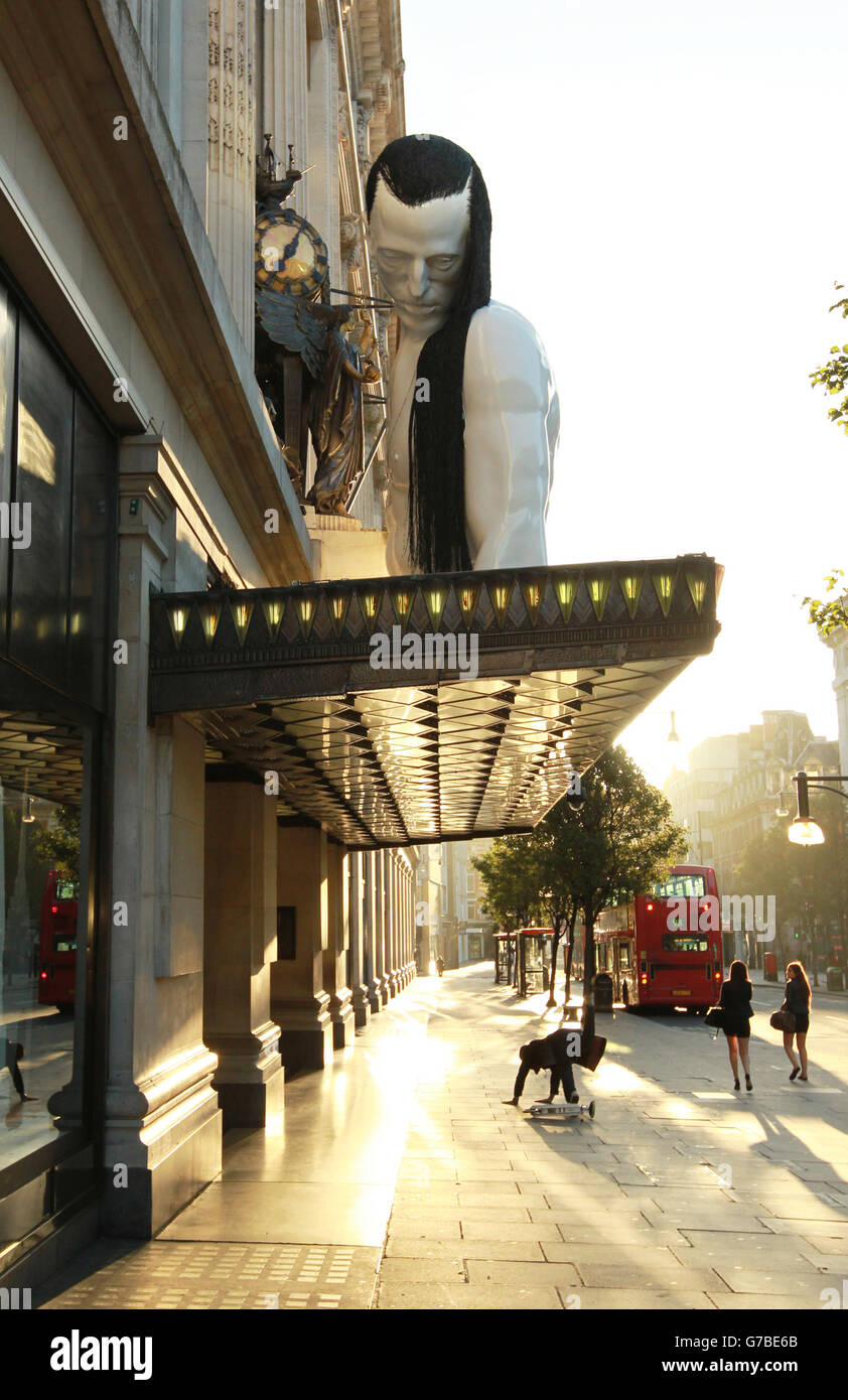 A 25-foot tall statue of American fashion designer Rick Owens is placed ...