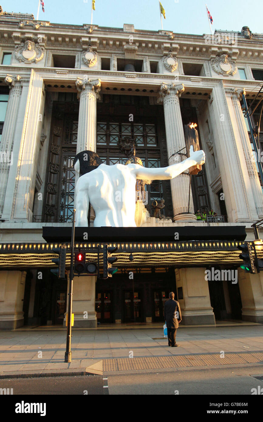 A 25-foot tall statue of American fashion designer Rick Owens is placed ...