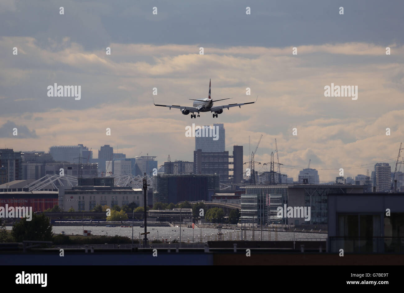 A plane making a final approach to land at City Airport, in east London ...