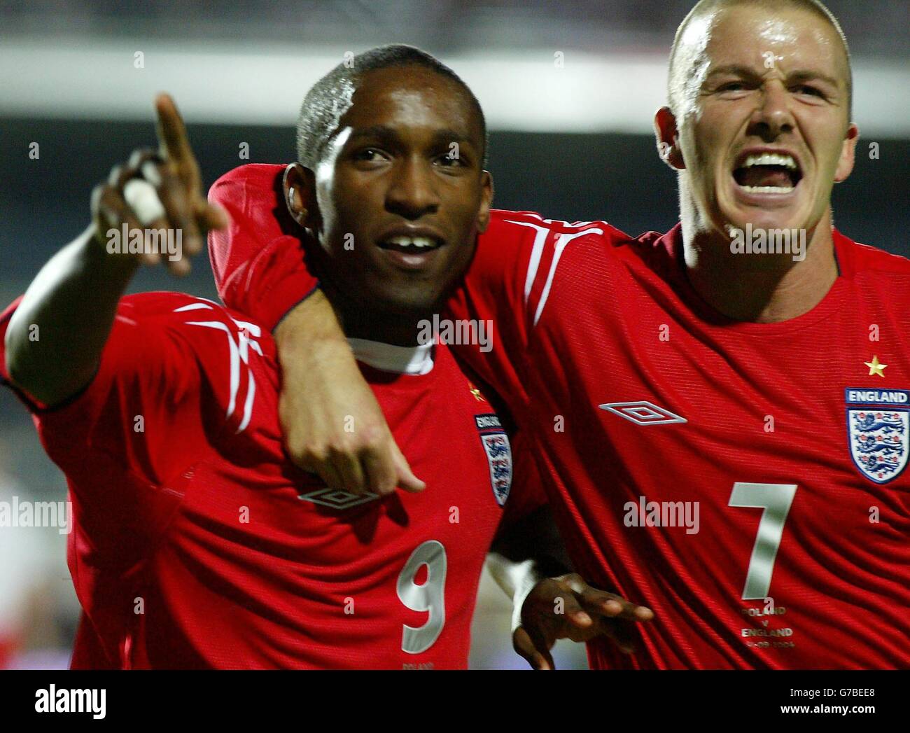England's Jermain Defoe (left) celebrates after scoring against Poland ...