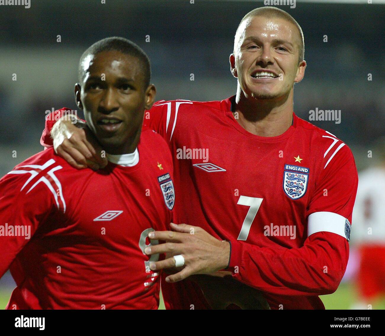England's Jermain Defoe (left) celebrates after scoring against Poland ...