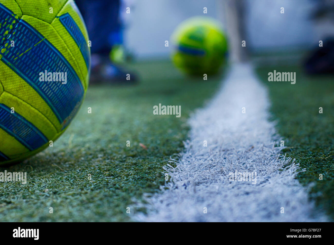 Photograph of a soccer bal on a blurred background Stock Photo - Alamy