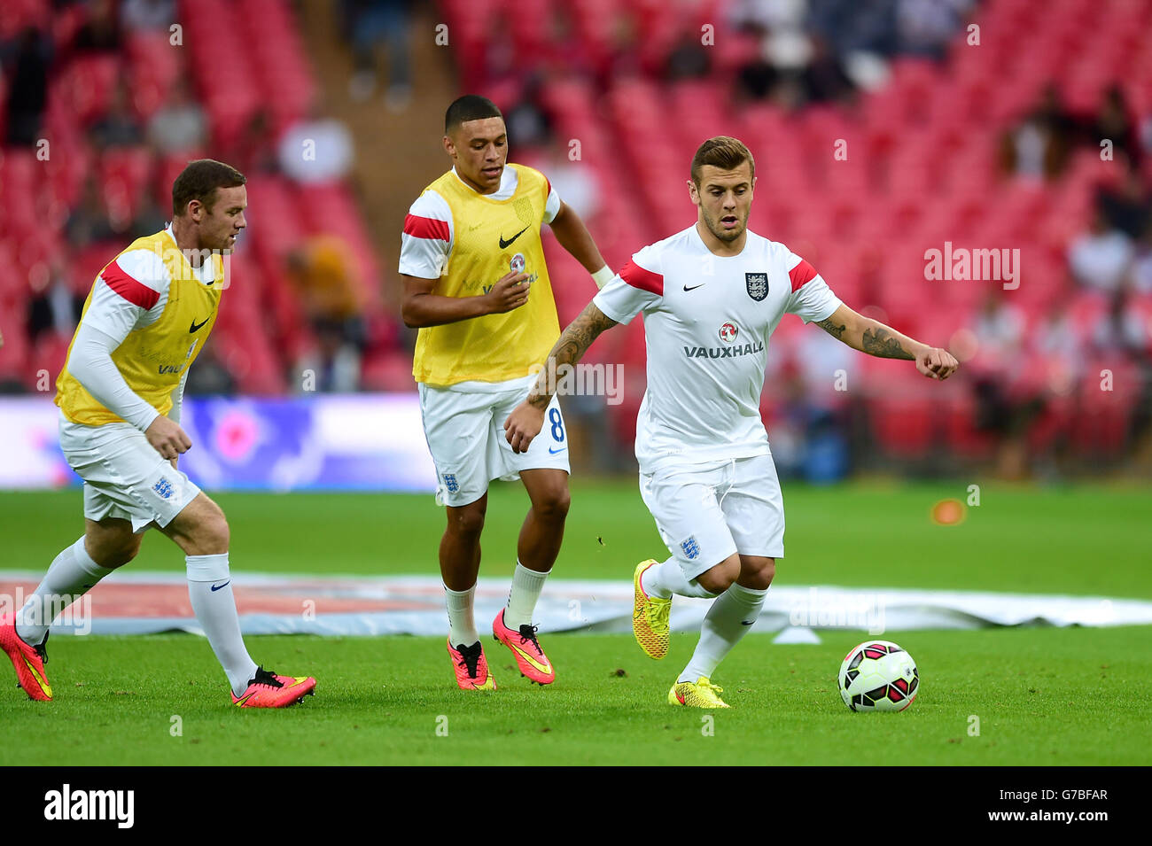 England captain Wayne Rooney (left), Alex Oxlade-Chamberlain and Jack ...
