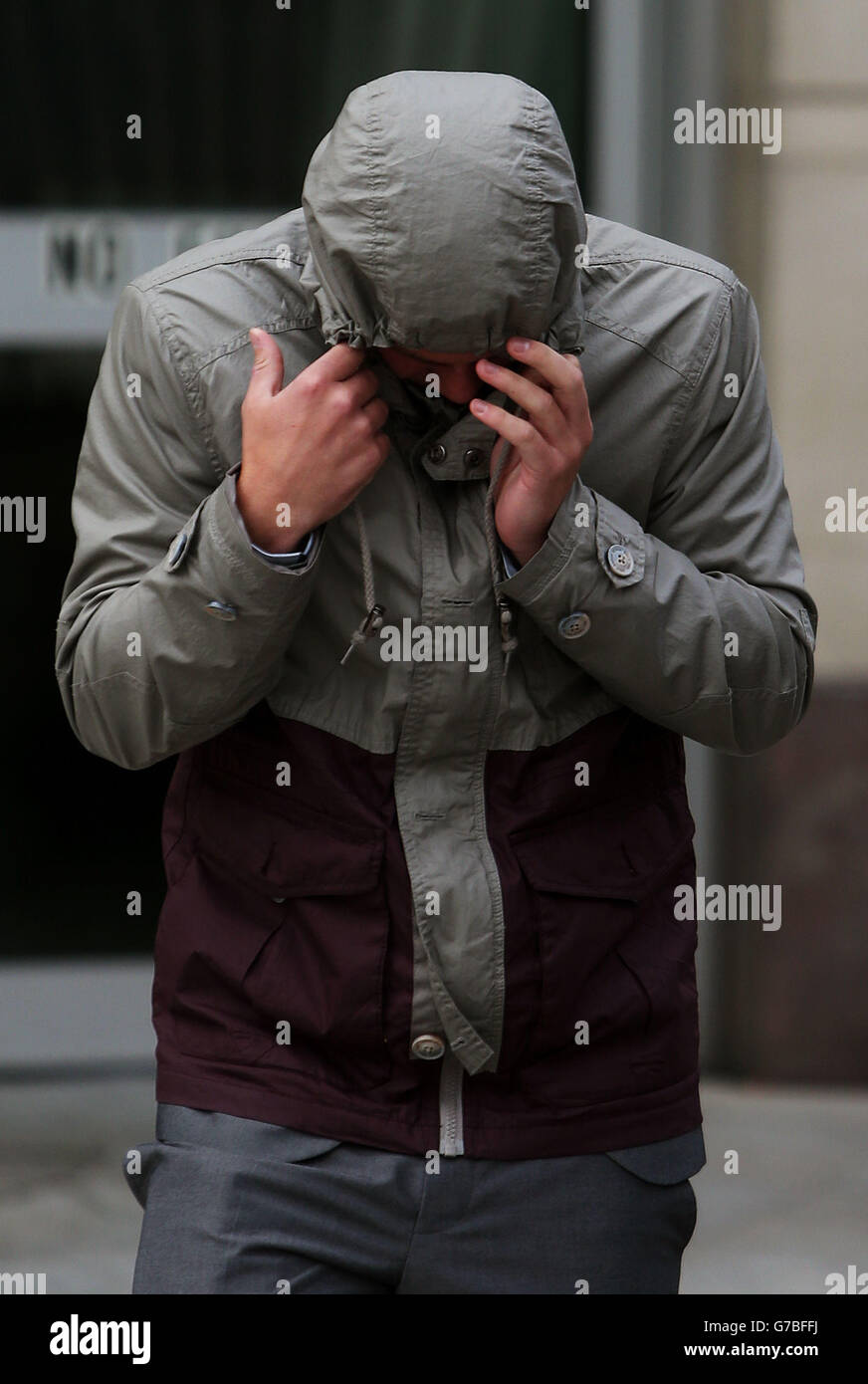 Jamie Downey leaves Belfast Crown Court during the trial of two men ...