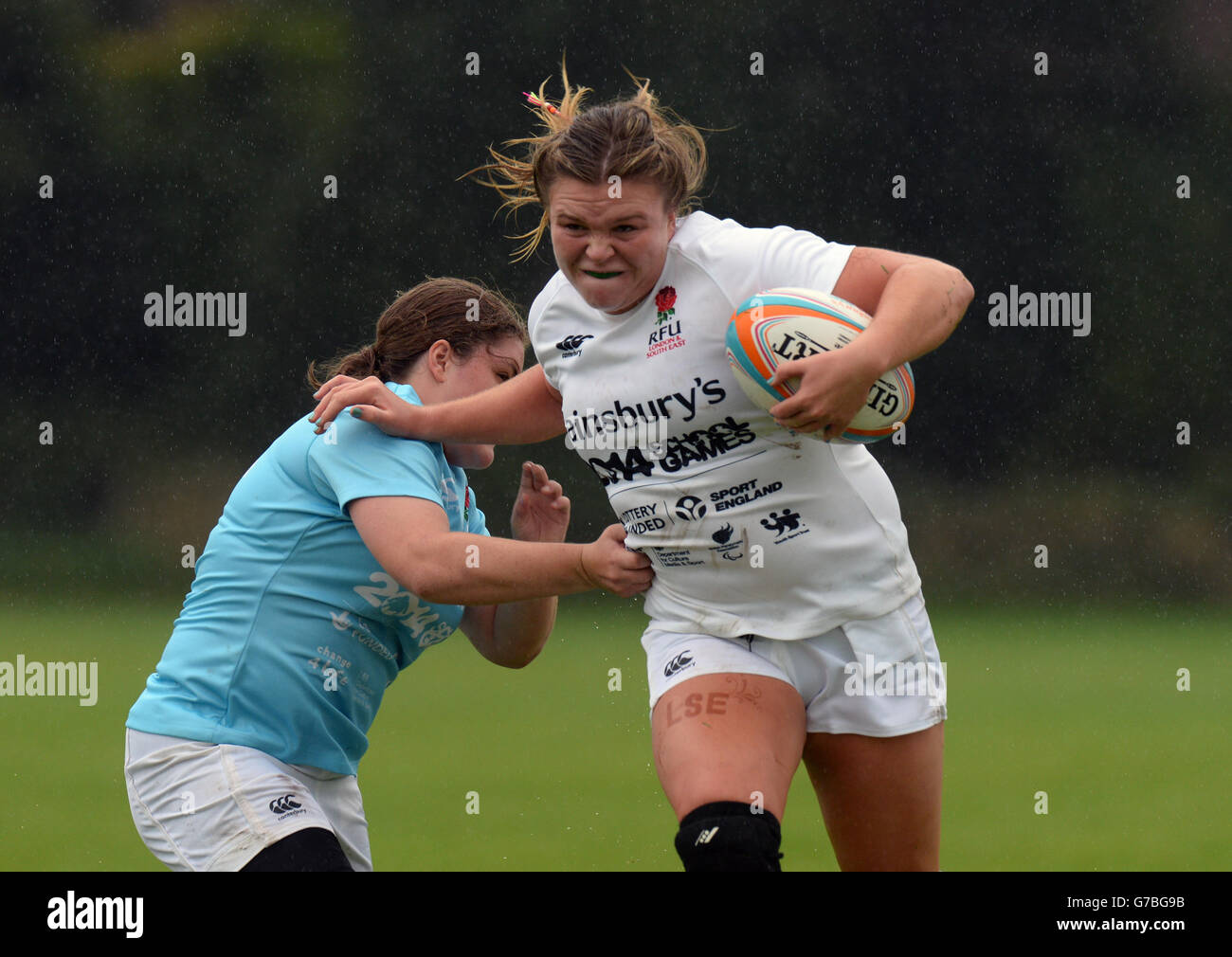 England London and South East's Sarah Bern hands off a tackle against ...