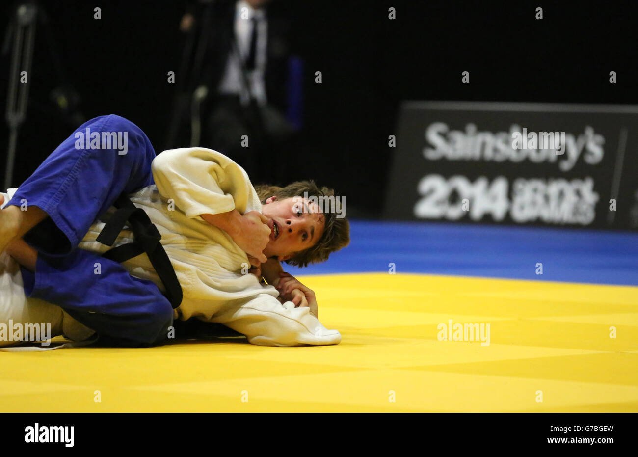Scotland's Del Imrie (white) and England's Sebastian Potter compete in ...