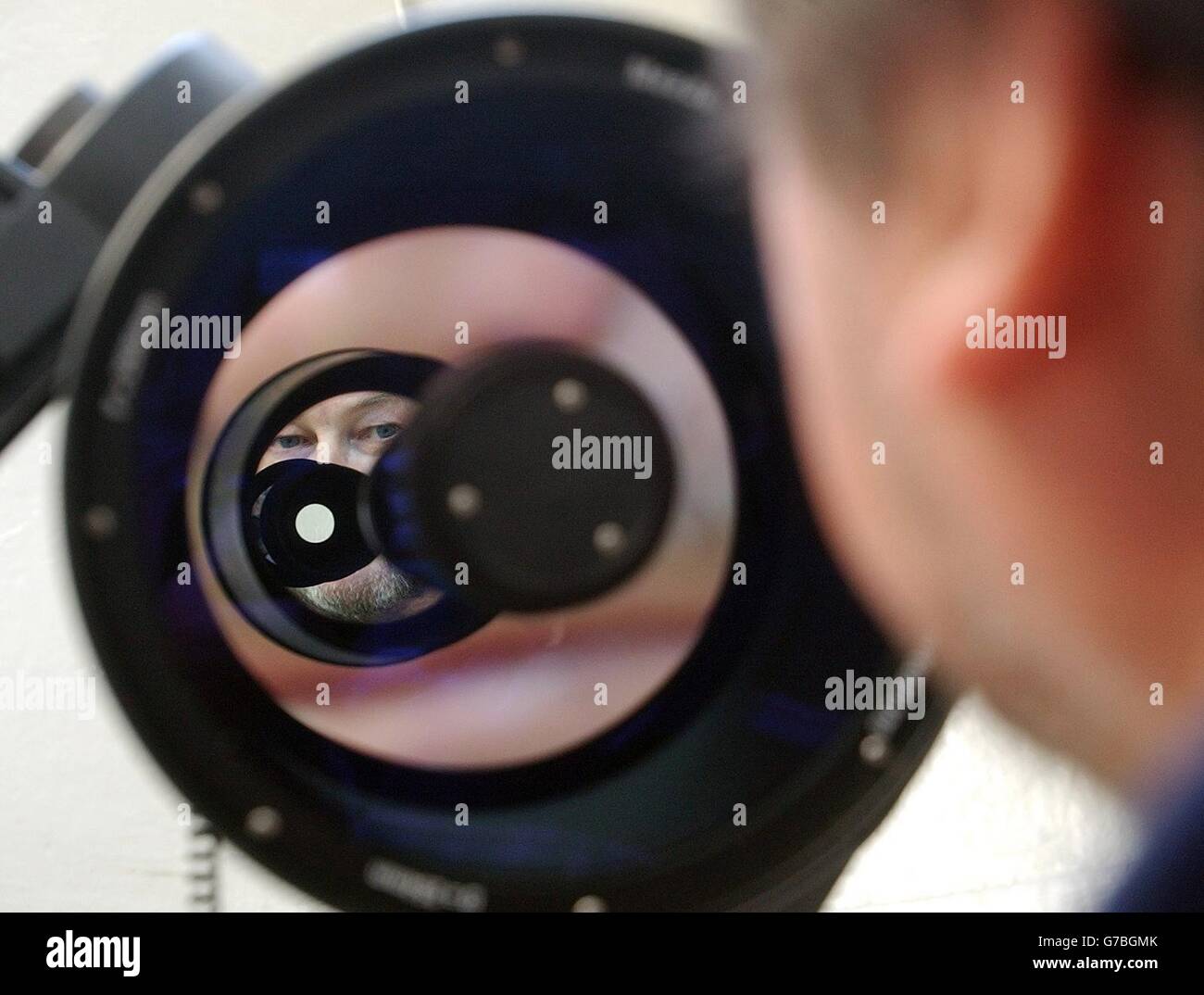 Farmer Ken Bennett, 59, with a telescope at his observatory in Cornwall ...