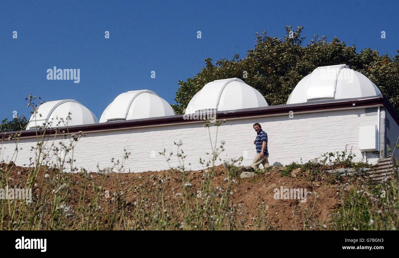 Farmer Ken Bennett, 59, with a telescope at his observatory in Cornwall ...
