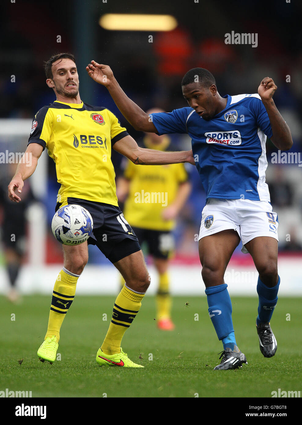 Oldham athletics dominic poleon and fleetwood towns liam hogan hi-res ...