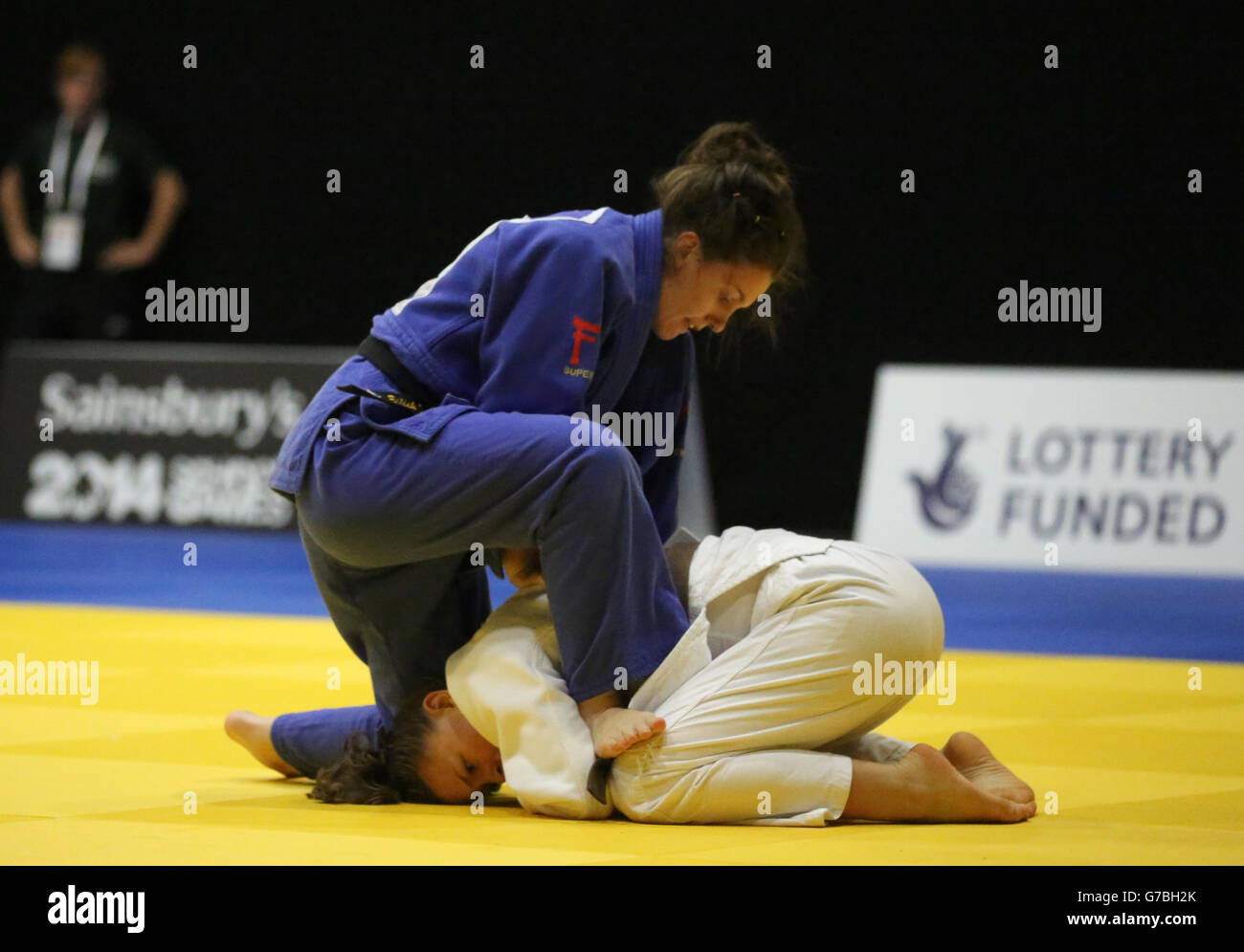 England's Chloe Nunn (white) and Scotland's Elish Walker compete in the ...