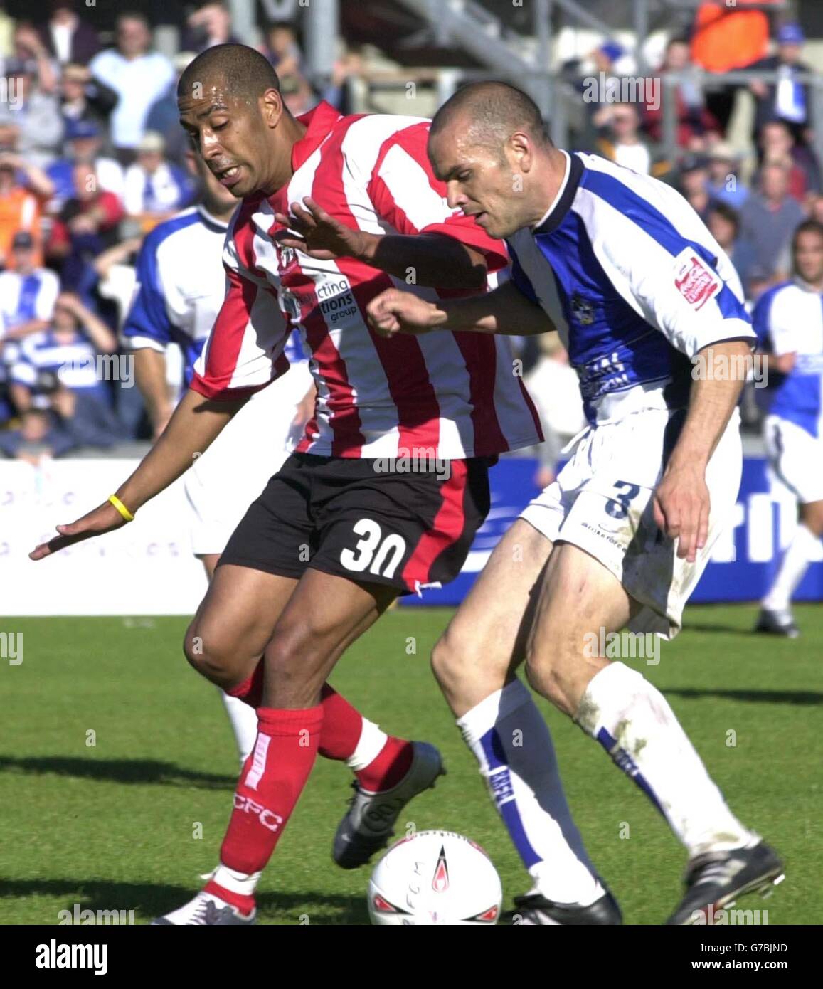 Lincoln City's Francis Green (left) battles with Bristol Rovers Robbie ...