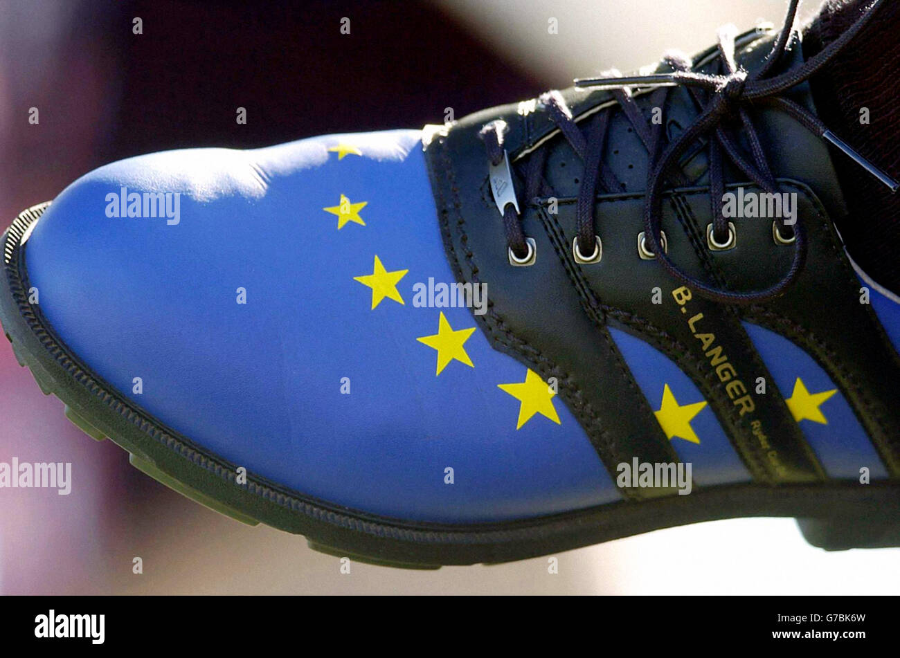 Europe's captain Bernard Langer shows off his new shoes during the 35th ...