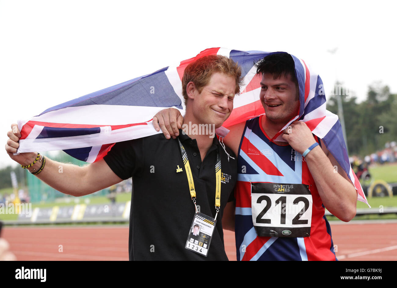 Prince Harry posing with British competitor David Henson, during day ...