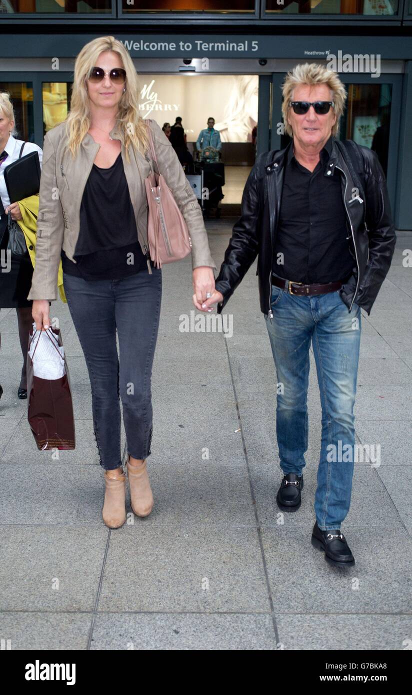 Rod Stewart and his wife Penny Lancaster arrive at Terminal 5 of ...