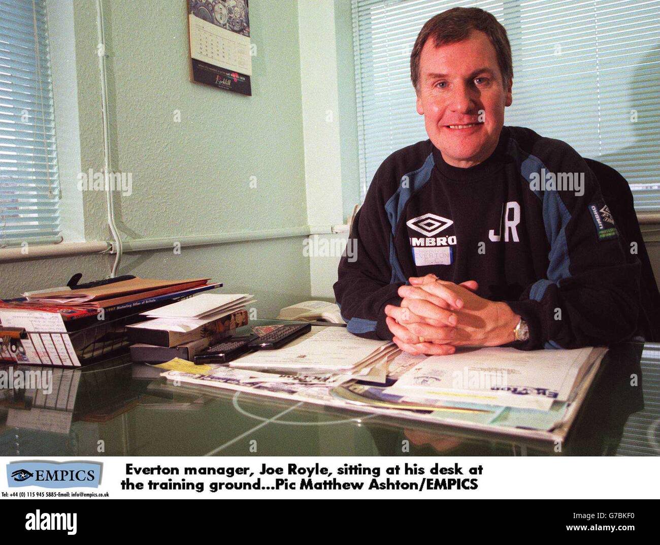 Everton manager, Joe Royle, sitting at his desk at the training ground ...