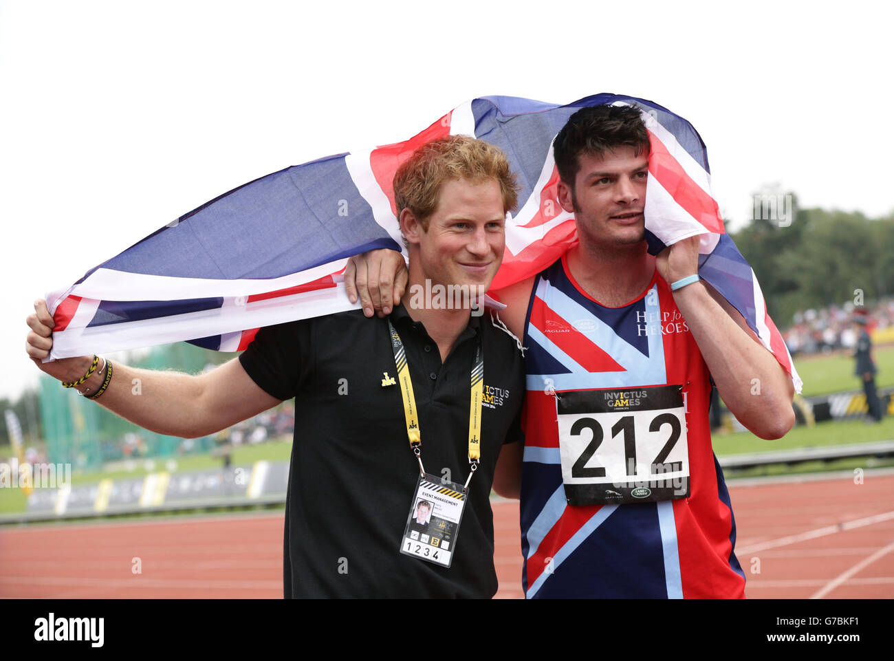 Prince Harry posing with British competitor David Henson, during day ...