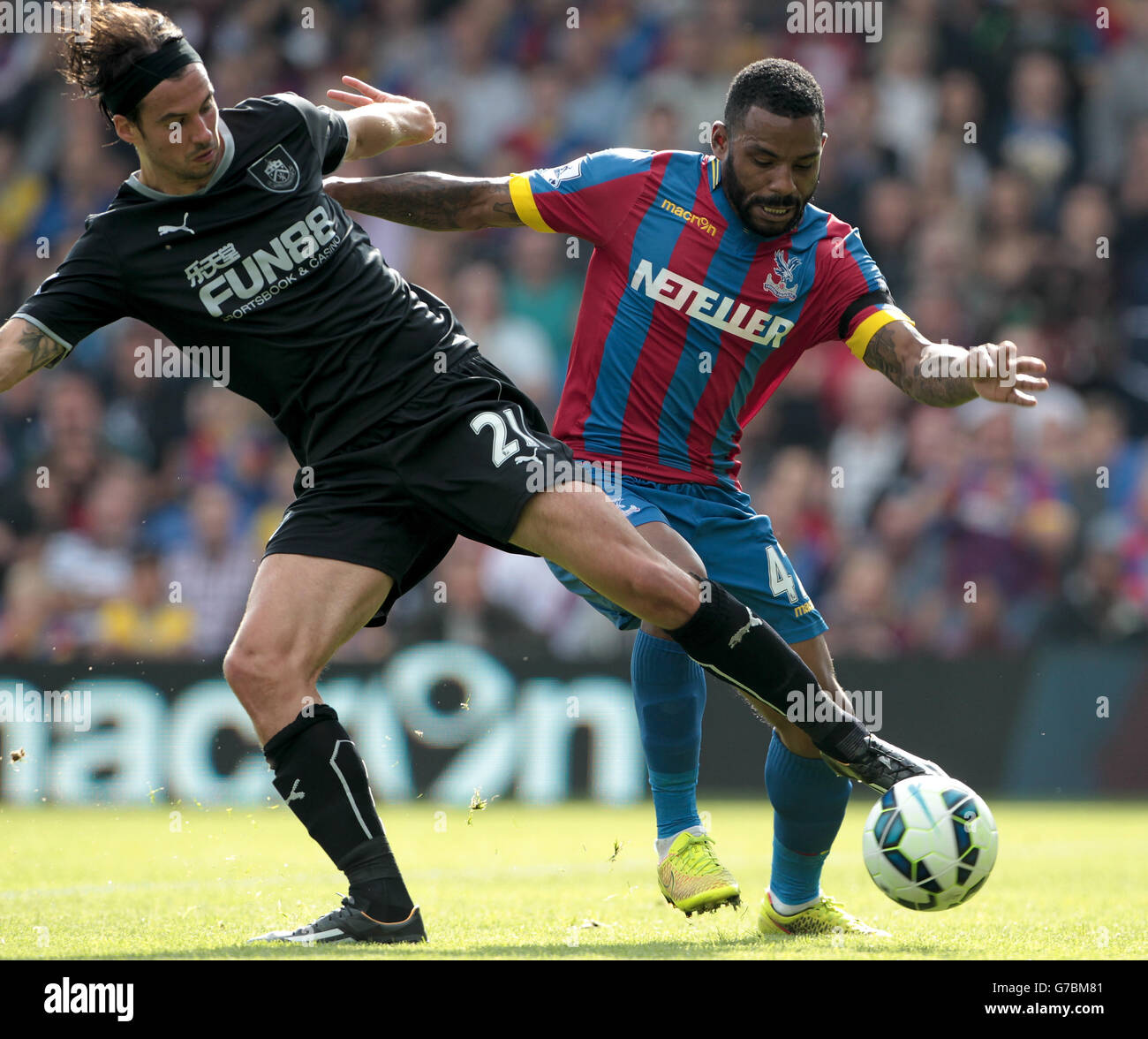 Crystal Palace's Jason Puncheon and Burnley's George Boyd battle for ...