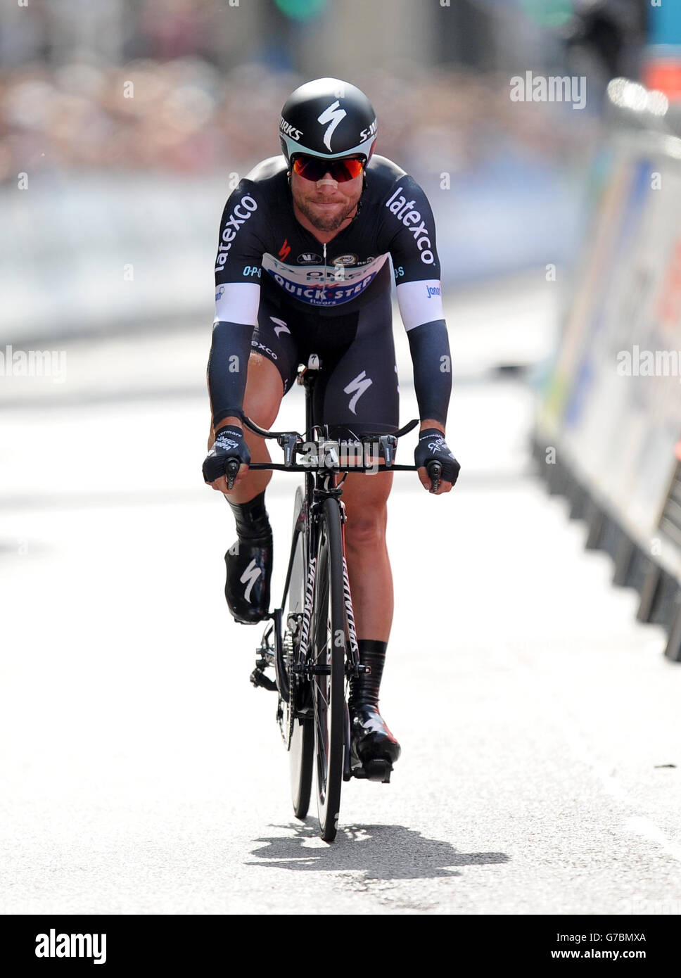Omega Pharma-Quickstep's Mark Cavendish crosses the finish line in the ...