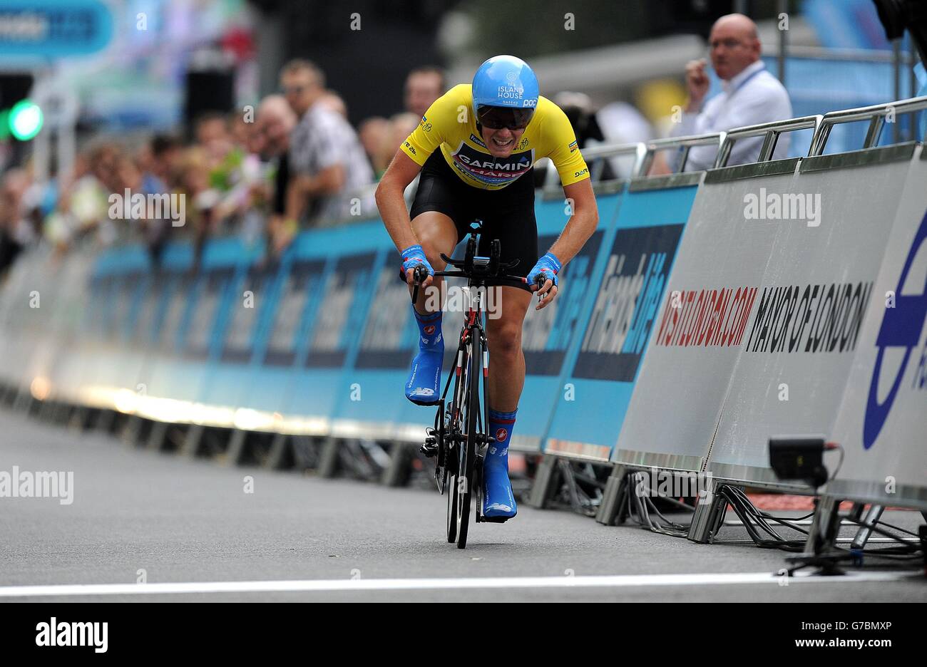 Garmin-Sharp's Dylan Van Baarle crosses the finish line in the ...