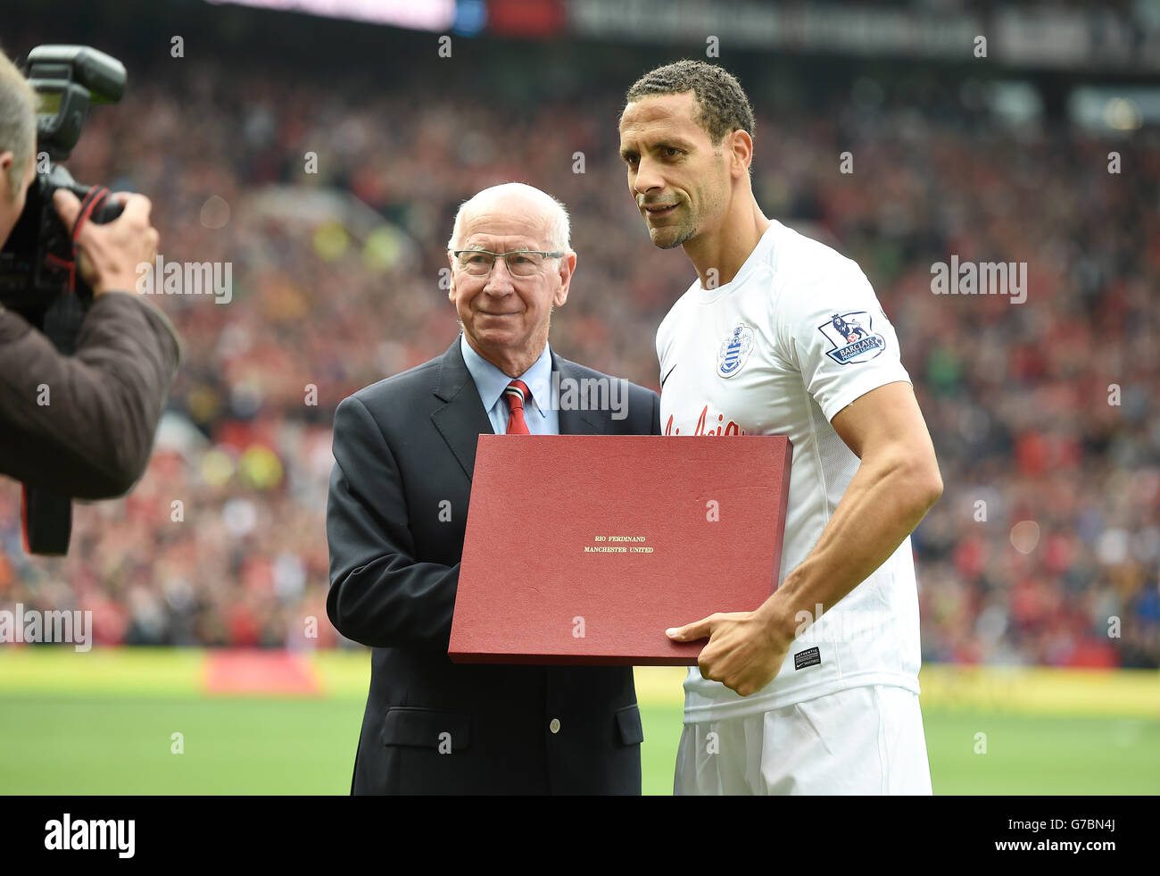 Queens Park Rangers' Rio Ferdinand poses for a photograph with Sir ...