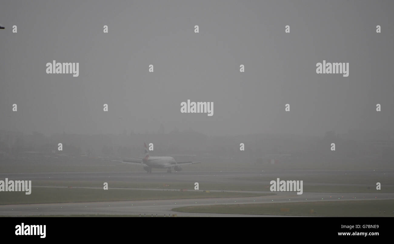 A plane lands at Heathrow Airport, west London as much of southern ...