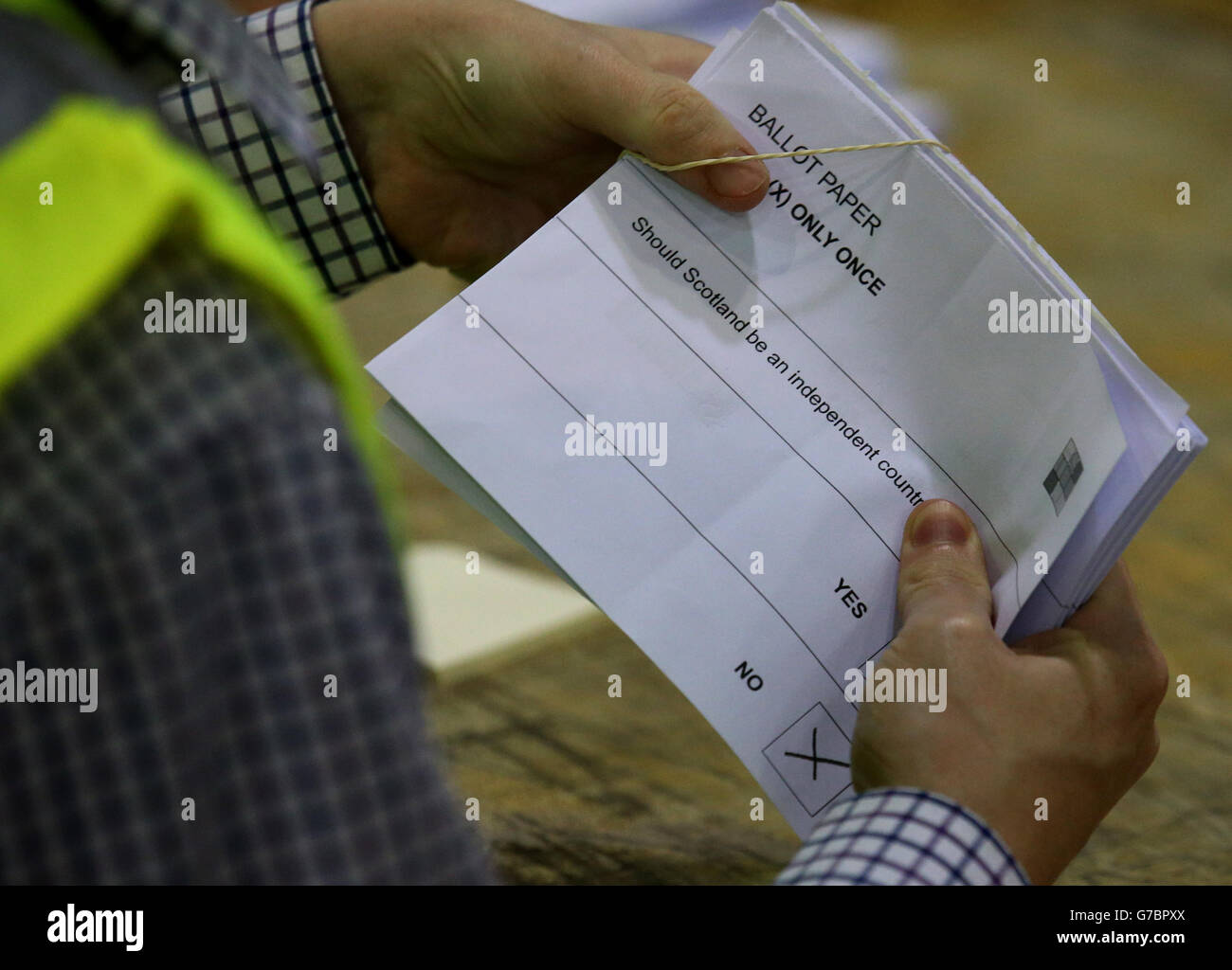 Ballot papers are counted through the night after votes were cast in ...