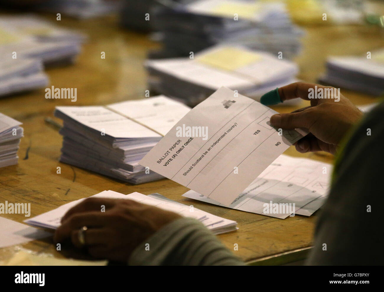 Ballot papers are counted through the night after votes were cast in ...