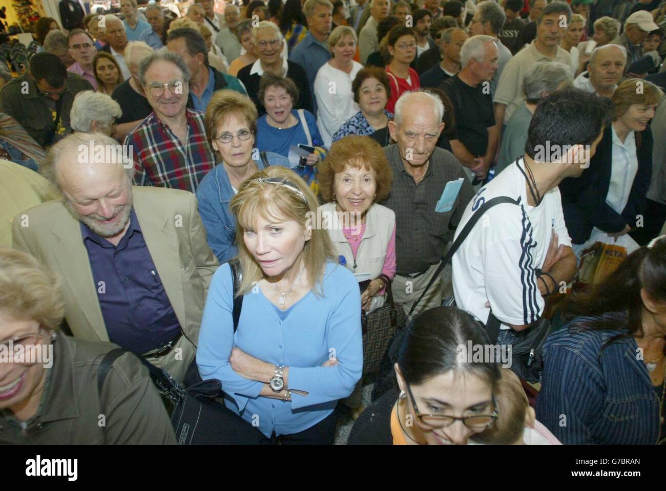 Passengers check in after security alert Stock Photo - Alamy