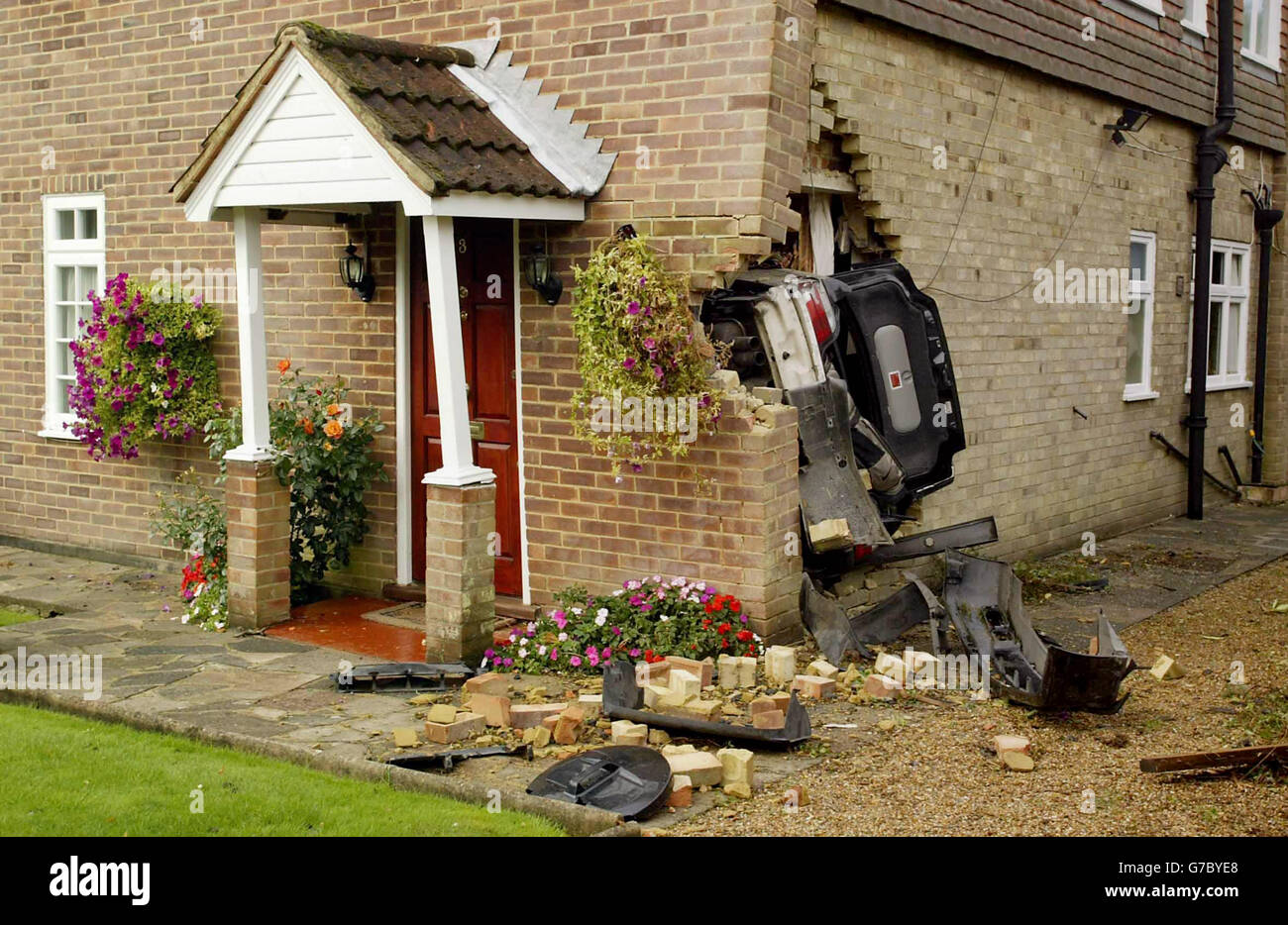The scene family lucky escape car smashed into home hi-res stock ...