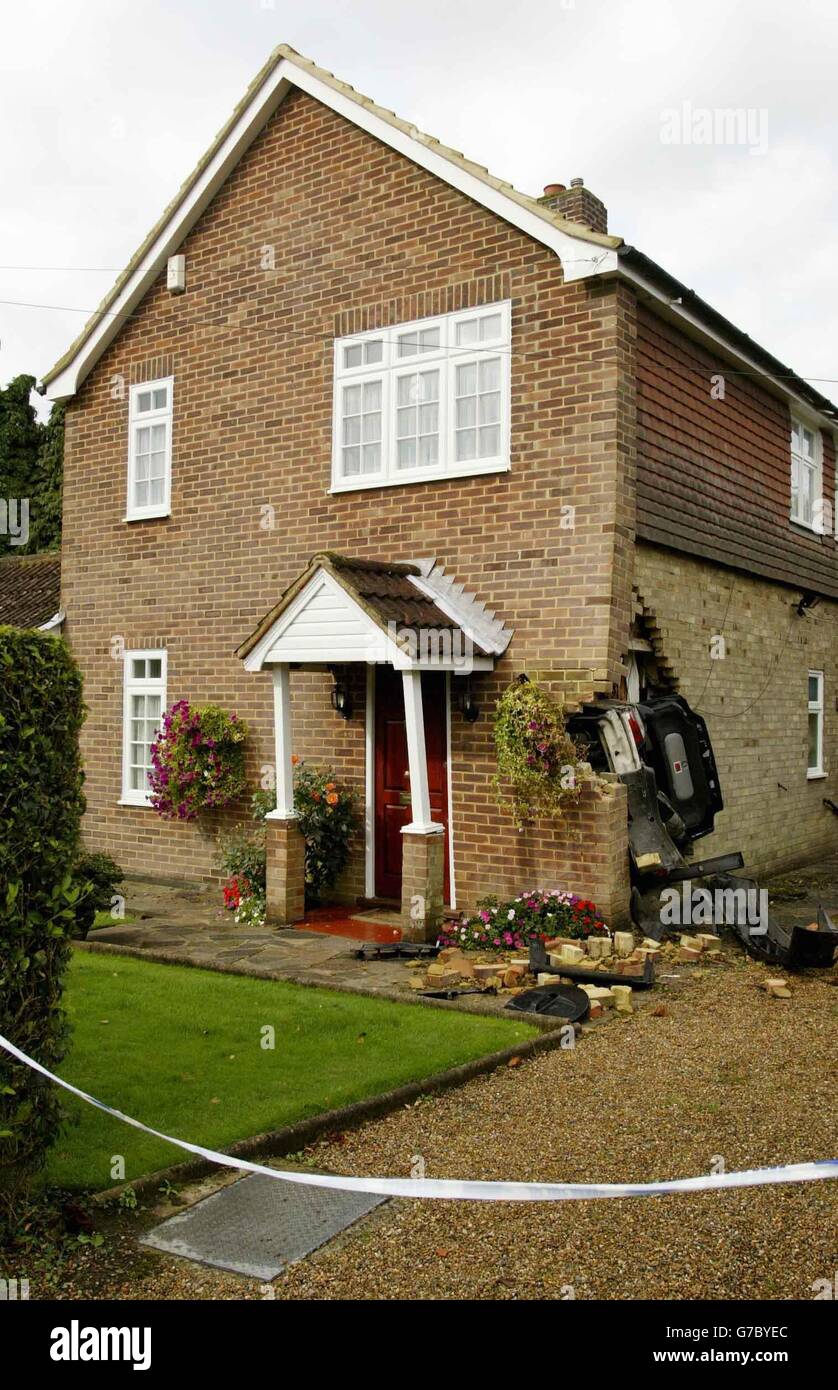 The scene family lucky escape car smashed into home hi-res stock ...