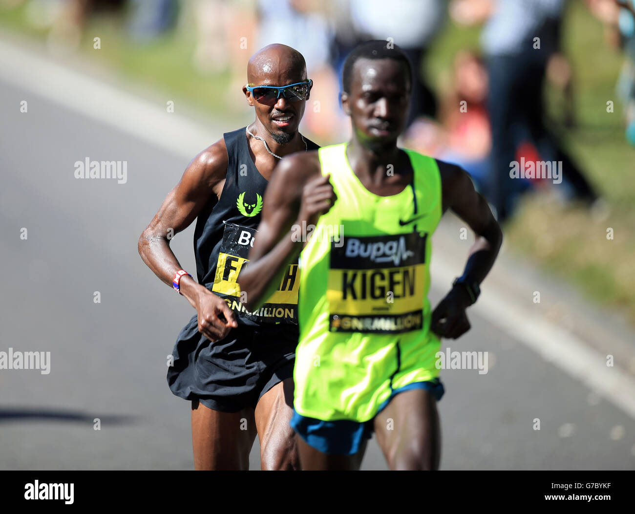 Mo Farah (left) and Mike Kigen (right) during 2014 Bupa Great North Run ...