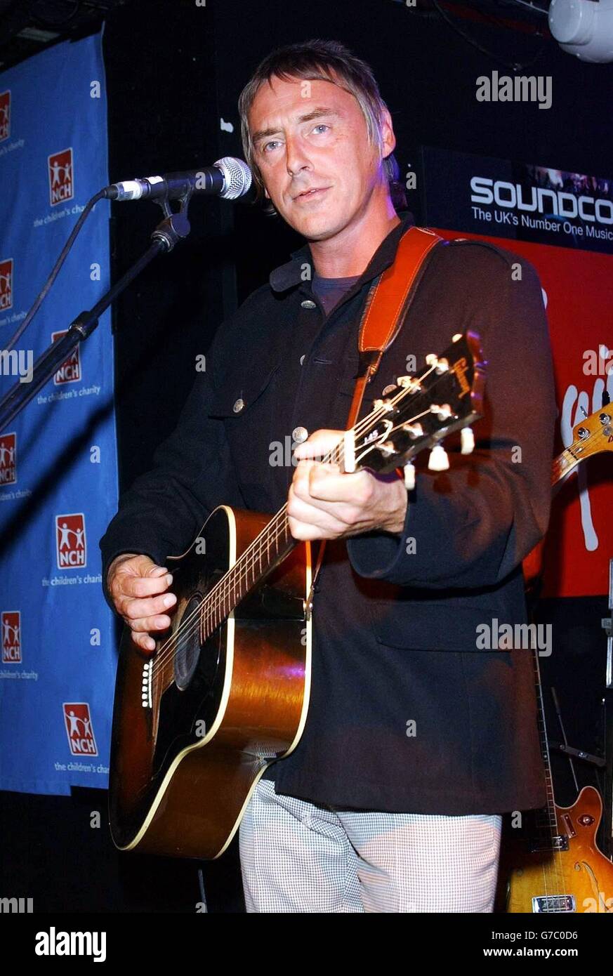 Singer Paul Weller performing at the Virgin Megastore, Oxford street ...
