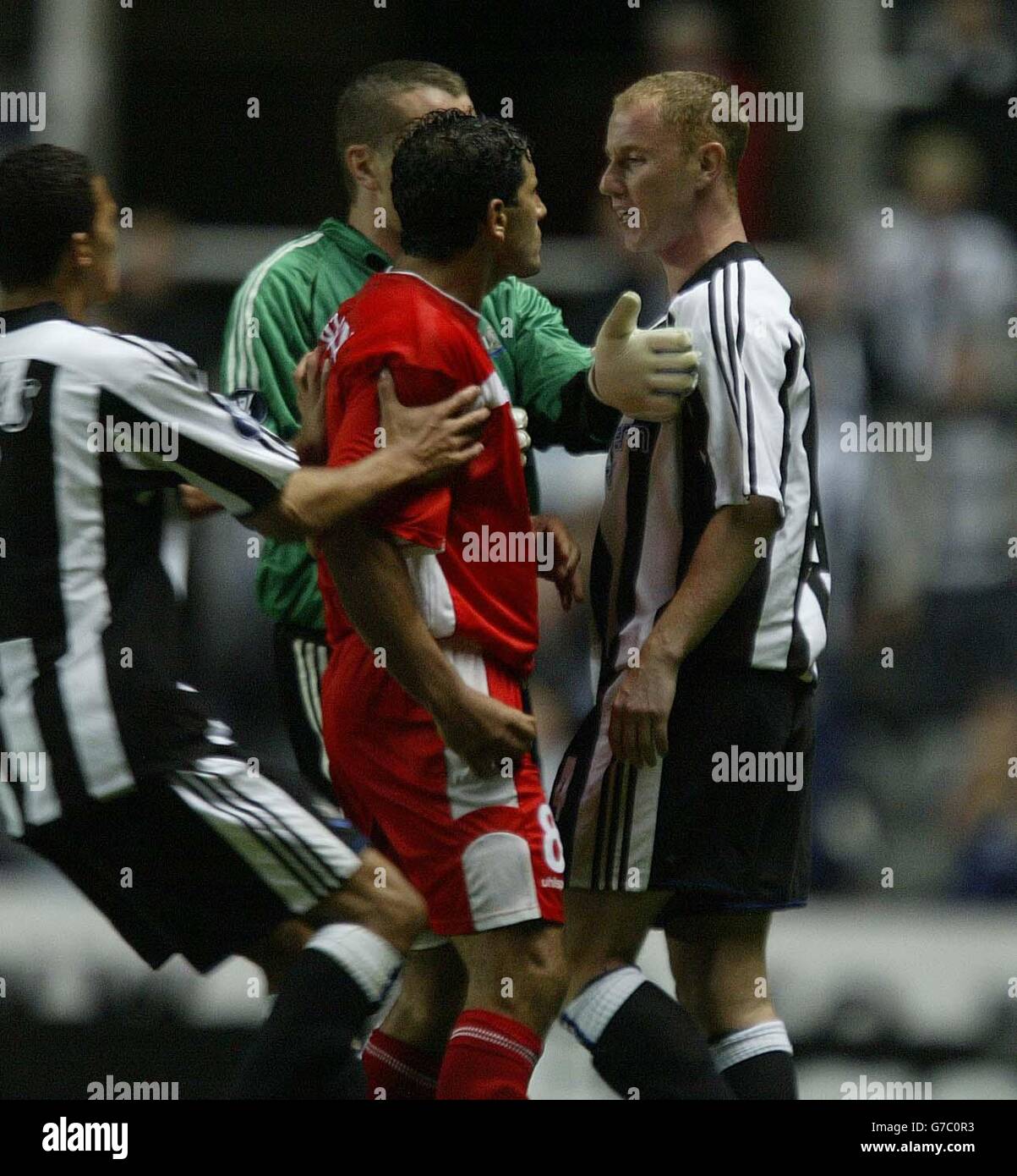 Newcastle's Nicky Butt squares up to Bnei Sachnin's Abas Suan during ...