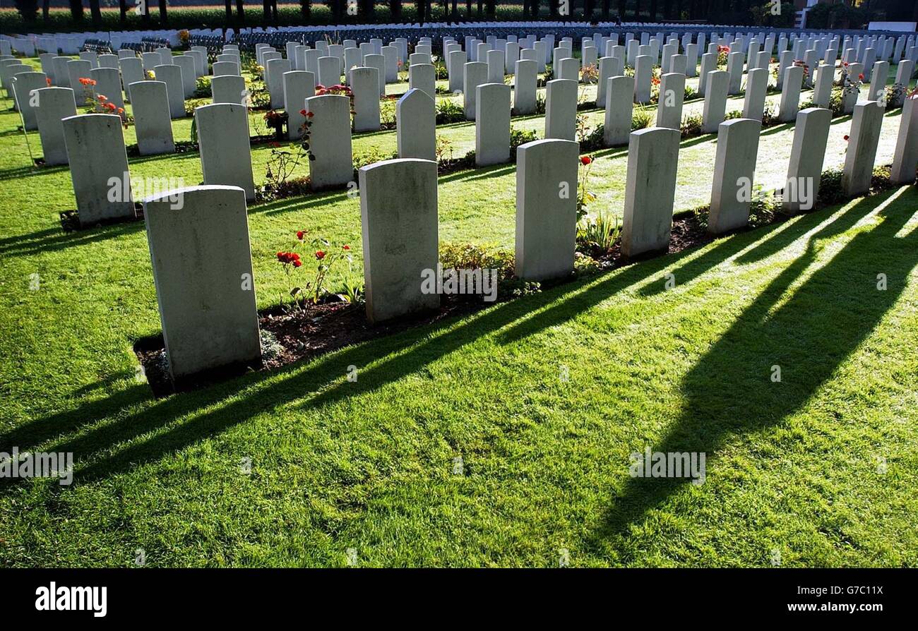 The shadow of a visitor at the Arnhem Oosterbeek War Cemetery, where ...