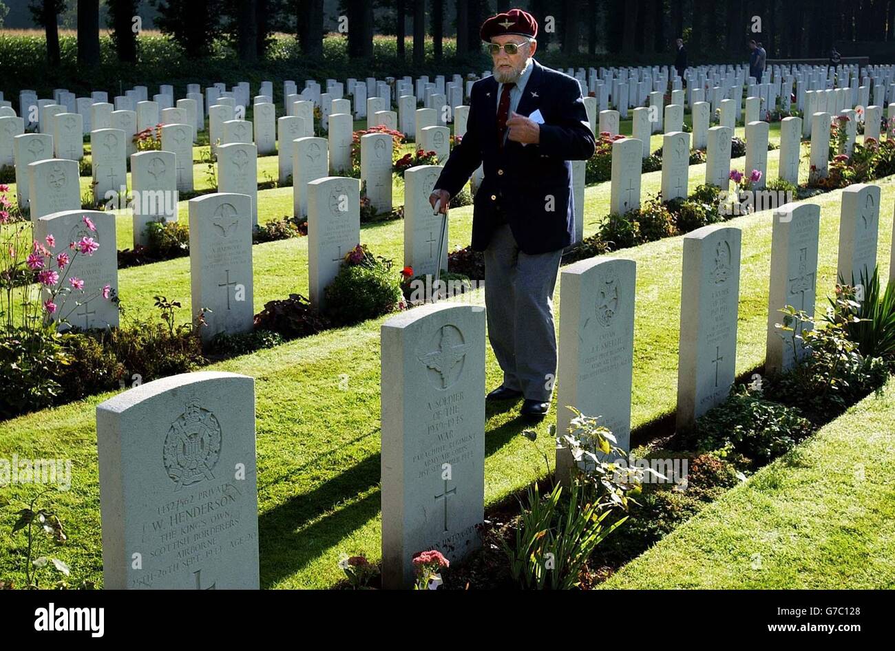 A veteran at the Arnhem Oosterbeek War Cemetery, Netherlands, where ...