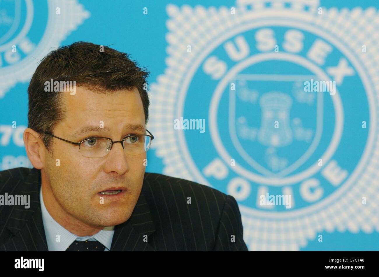 Detective Chief Inspector Adam Hibbert of Sussex Police speaks to the ...