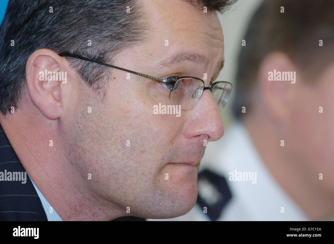 Detective Chief Inspector Adam Hibbert of Sussex Police speaks to the ...