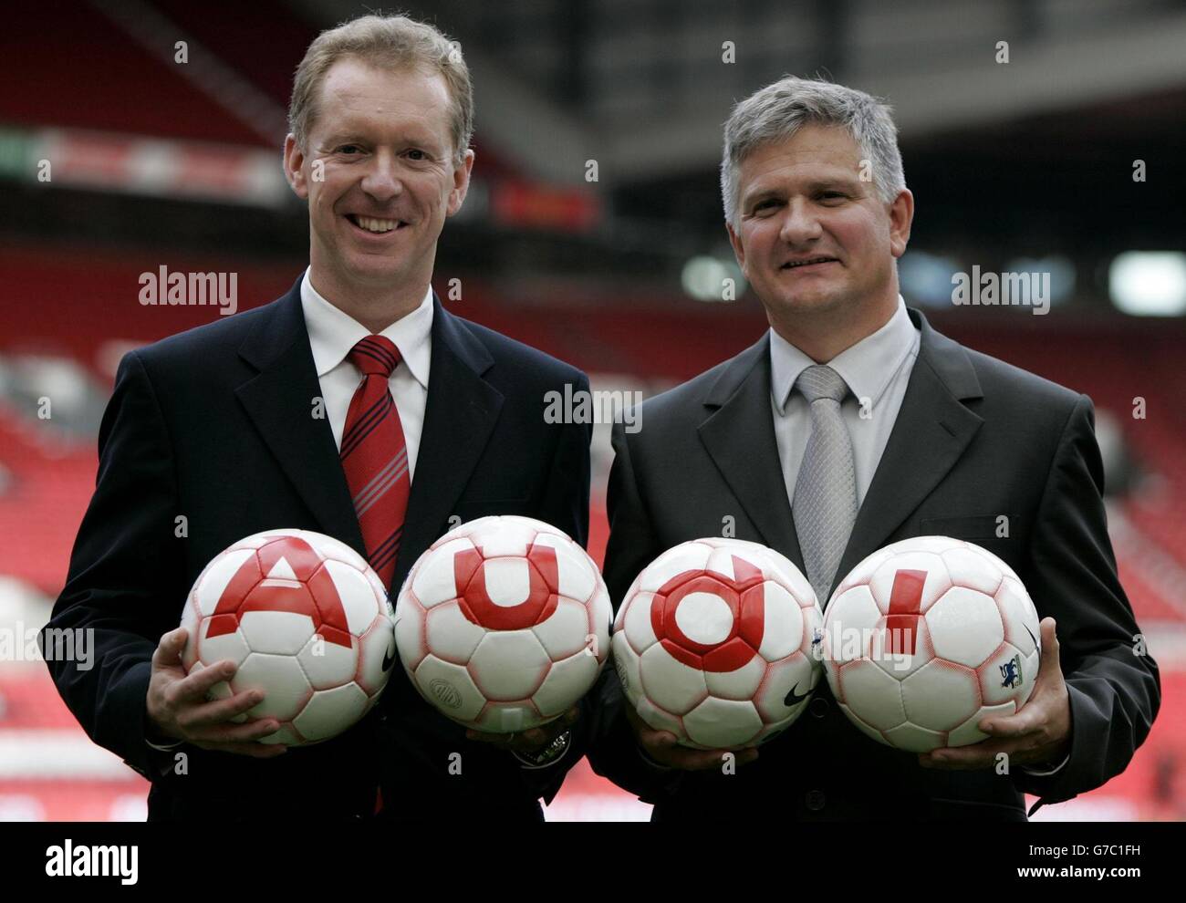 Manchester United's Commercial director Andy Anson (left) and Gary ...