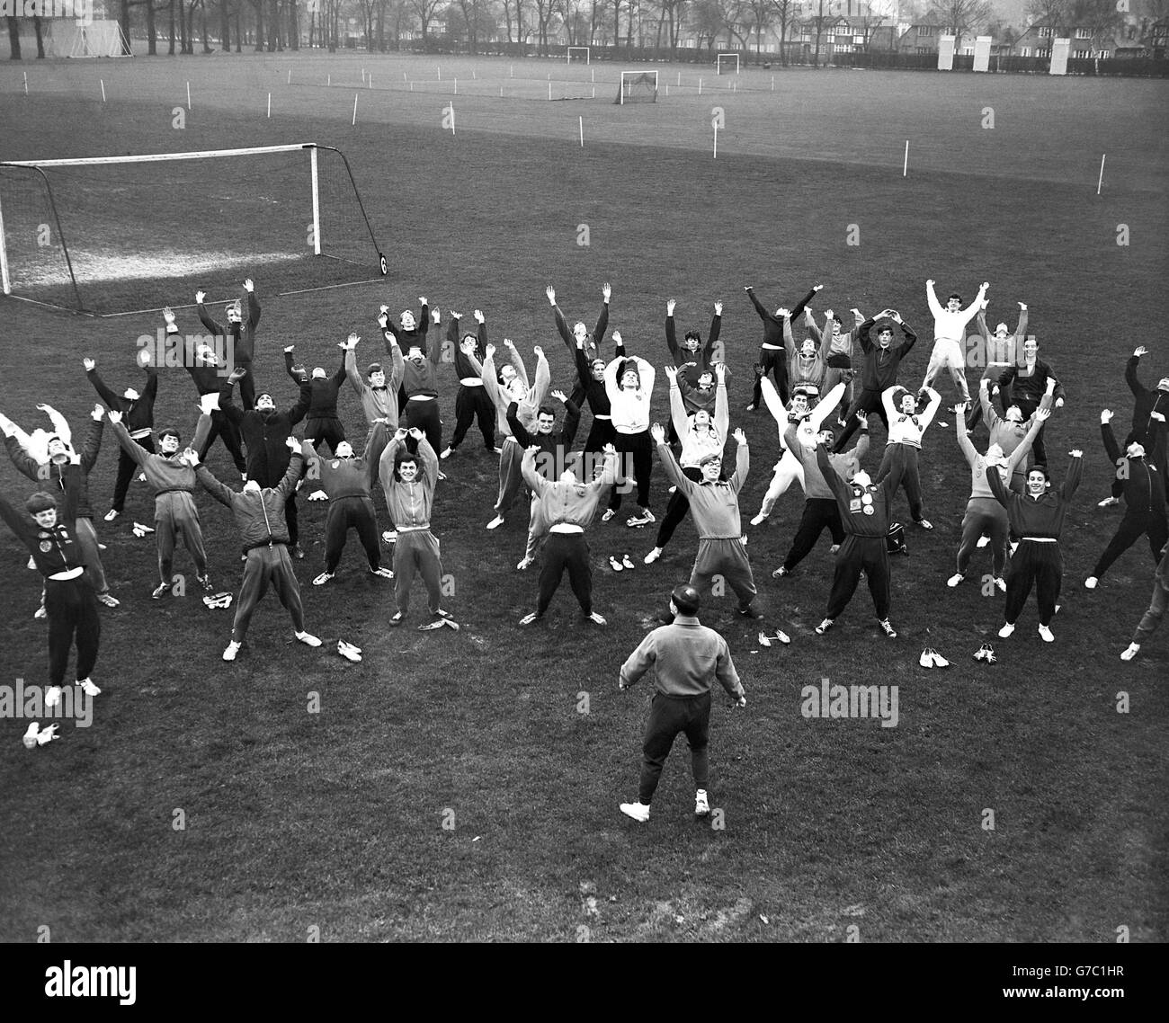 The young athletes are given various exercise by Mr. Alec Thompson ...
