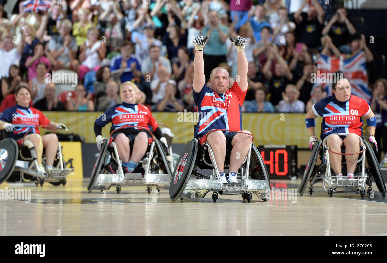 Great Britain's Gerraint Price (centre) celebrates victory during ...